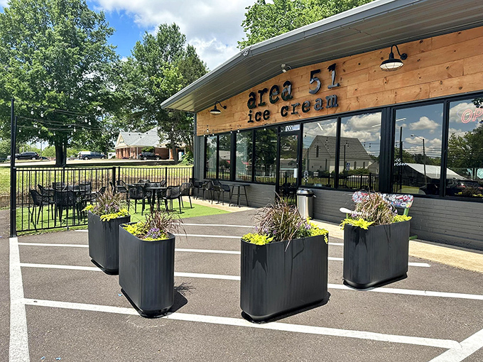 The illuminated wooden facade of Area 51 Ice Cream beckons like a beacon of sweetness in the night. Extraterrestrial delights await inside this unassuming Hernando storefront. 