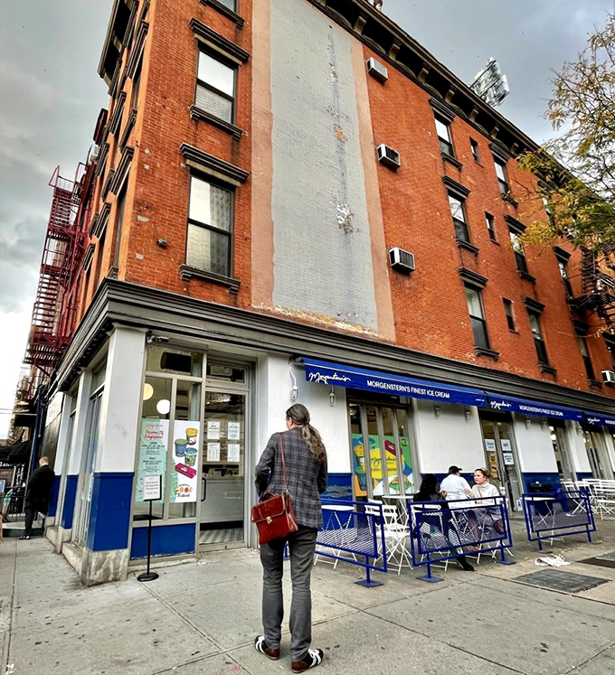 That iconic blue awning against classic New York brick is like a beacon for ice cream pilgrims. Sidewalk seating adds the perfect touch of urban charm.