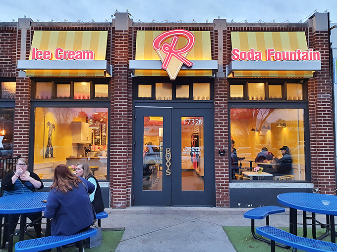 The iconic yellow awnings and signature "R" logo of Roxy's beckon like a sweet siren call, promising frozen bliss in Oklahoma City's vibrant Plaza District.