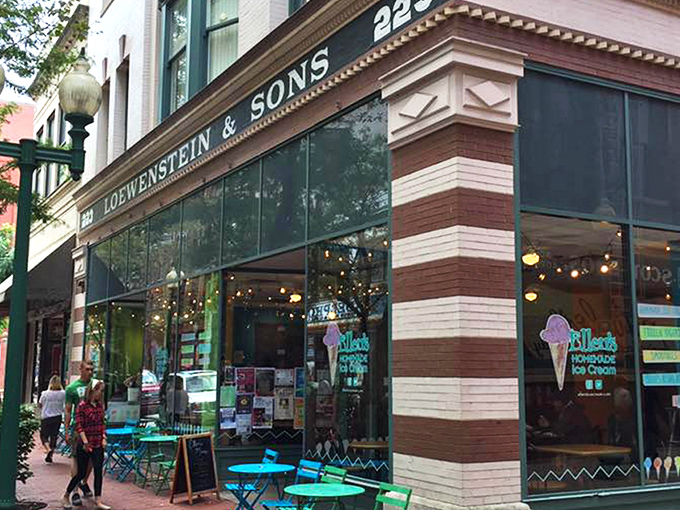 Ellen's vibrant storefront beckons from Capitol Street like a colorful oasis in downtown Charleston. That clock isn't just telling time&mdash;it's counting down to your next ice cream fix.