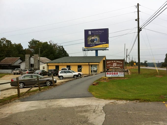 The unassuming yellow exterior of Bar-B-Q Shack hints at the culinary treasures within. Like all great barbecue joints, it lets the smoke do the talking.
