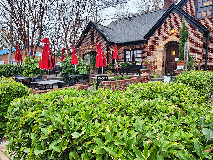 The Manchester Arms brings quintessential British charm to College Park with its stately brick exterior and inviting red patio umbrella. England has landed in Georgia!