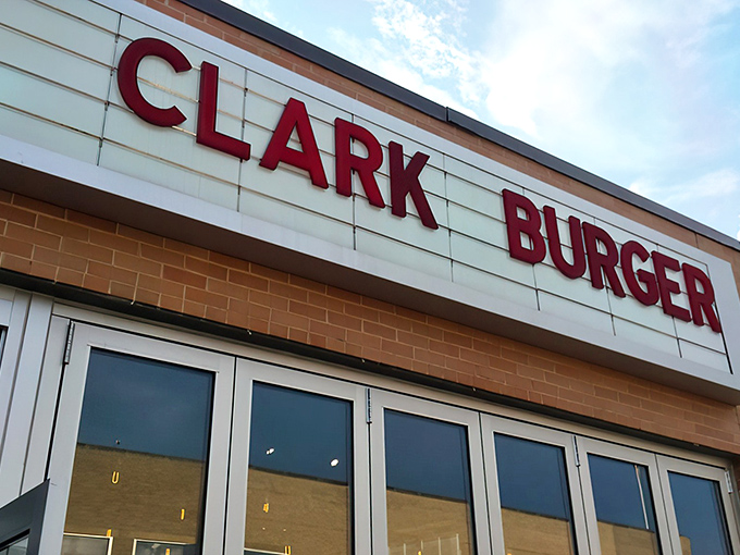 The bold red letters against the brick facade aren't just signage – they're a beacon calling to burger lovers across Baltimore like a meaty lighthouse.