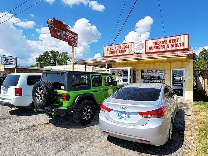 The neon promise of burger paradise! Hank's iconic sign has been guiding hungry Tulsans to burger bliss since the days when Elvis was still topping the charts.