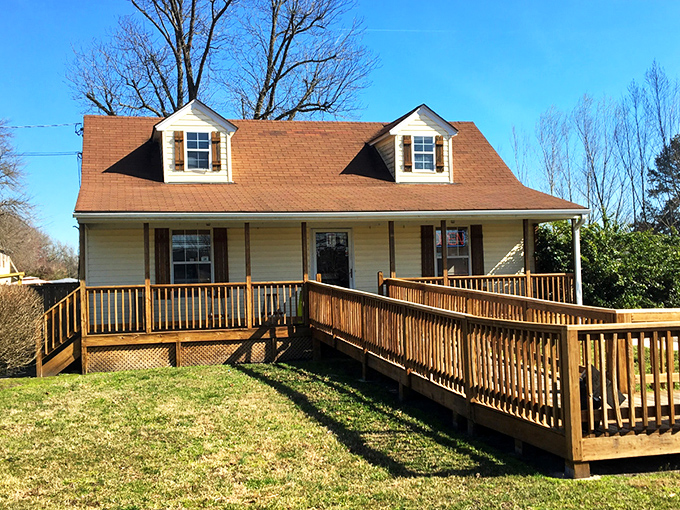 The unassuming Cape Cod-style exterior of The BBQ Shack proves once again that the best barbecue joints don't waste money on fancy architecture&mdash;they invest in smoke and time.