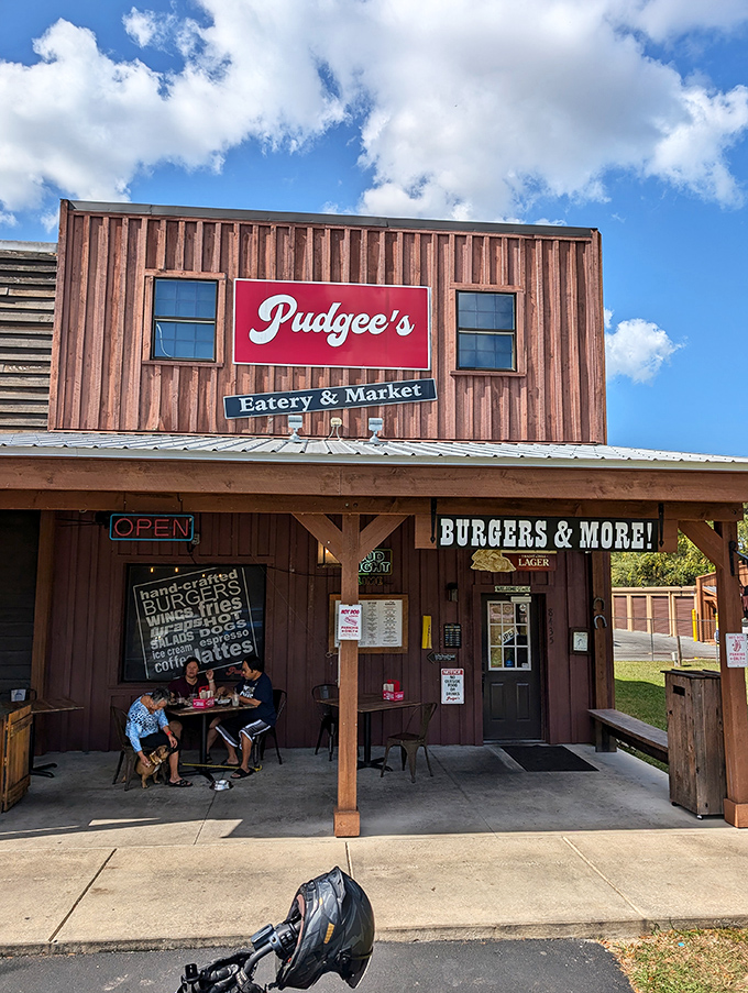 Welcome to Pudgee's, where rustic charm meets culinary delight! This unassuming exterior houses a treasure trove of flavors that'll make your taste buds do a happy dance.