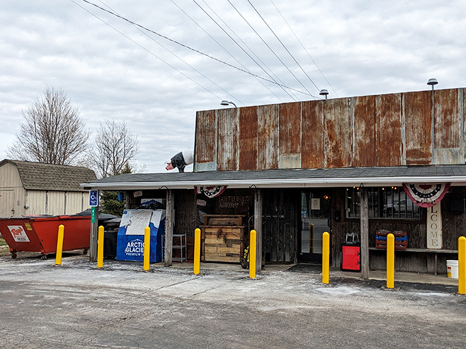 The weathered exterior of Rusted Silo isn't just authentic&mdash;it's a time machine disguised as a barbecue joint. Those yellow posts aren't just practical; they're exclamation points announcing culinary treasure.