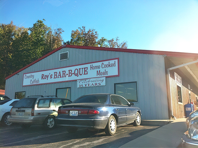 The unassuming exterior of Roy's BAR-B-QUE in Russellville might not stop traffic, but locals know this building houses smoky treasures worth any detour.