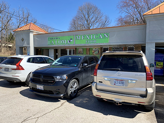 The unassuming exterior of Taqueria La Loma might not scream "culinary destination," but that green sign is basically a beacon for tamale lovers across Ohio.