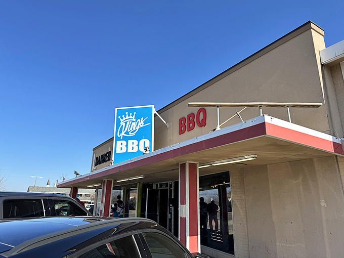 The blue crown sign beckons like a barbecue lighthouse. At King's, they don't need fancy exteriors when what's inside speaks volumes.