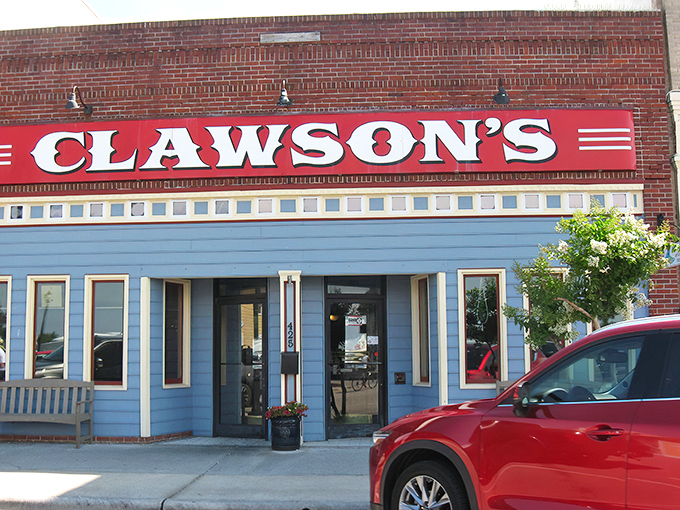 That iconic red Clawson's sign against the historic brick building is like a lighthouse for hungry souls navigating downtown Beaufort.