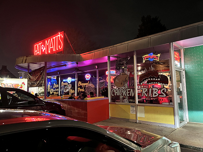 The neon glow of Fat Matt's sign is like a barbecue beacon in the night, calling hungry souls to meat salvation on Piedmont Avenue.