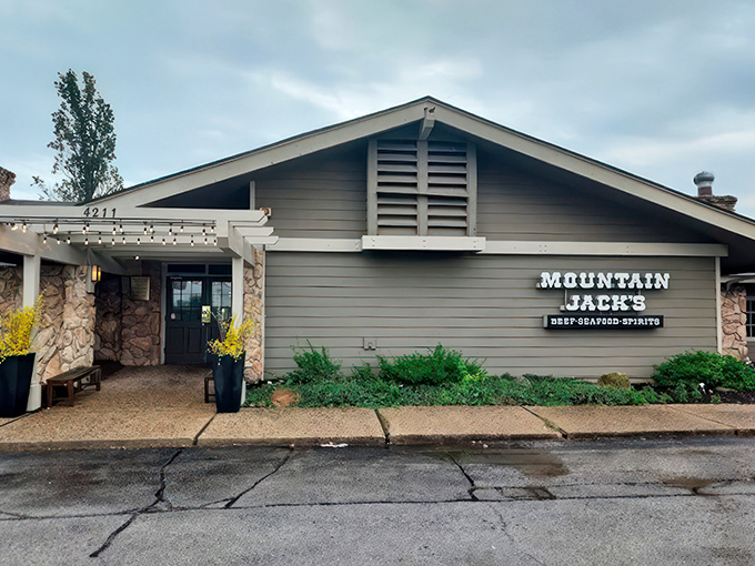 The understated entrance to carnivore paradise. Stone accents and string lights whisper "special occasion" even before you smell the prime rib.