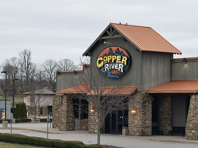 The rustic lodge-inspired exterior of Copper River Grill stands like a culinary beacon in Nicholasville, promising mountain-worthy meals in Kentucky's heartland.