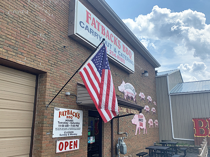 The pink pig silhouettes on Fatback's brick exterior aren't just decoration&mdash;they're a roadmap to flavor paradise. Welcome to pork heaven!