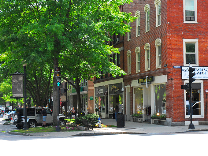 Downtown Keene's colorful storefronts welcome visitors with New England charm. Those awnings aren't just pretty&mdash;they're perfect for window shopping in any weather.