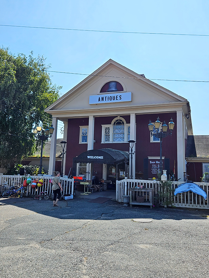 A New England time portal disguised as a charming red building with white trim. Cape Cod's architectural equivalent of "come on in, we've got stories to tell."