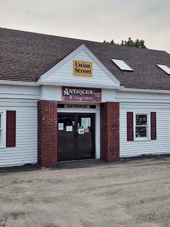 The unassuming exterior of Union Street Antiques beckons with its yellow sign and classic New England charm&mdash;a time portal disguised as a simple white building.