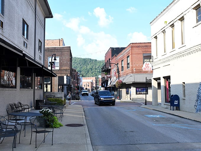 Pikeville's historic downtown showcases classic brick architecture against a backdrop of blue Kentucky skies, where small-town charm meets thoughtful preservation.