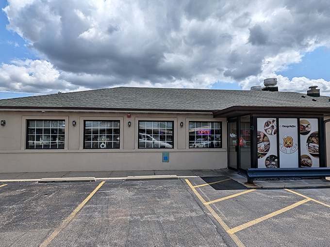 The unassuming exterior of Chicago Waffles might not stop traffic, but locals know this beige building houses breakfast magic worth seeking out.