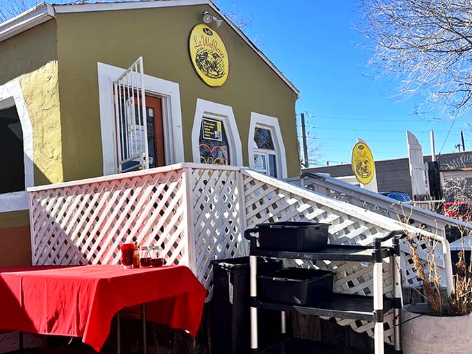 The cheerful mustard-yellow exterior of Tia B's La Waffleria stands like a beacon of breakfast hope in Albuquerque's landscape. 