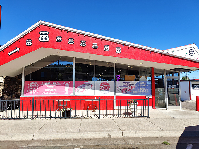 A slice of Americana, served with a side of nostalgia! Goldies Route 66 Diner stands proud, its red exterior as inviting as a warm cherry pie on a windowsill.