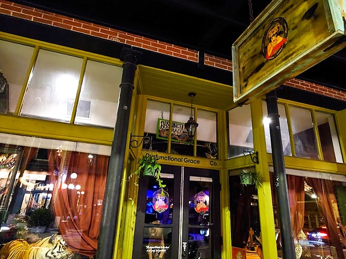 The storefront glows with an otherworldly golden light at dusk, beckoning curious souls into Tampa's most delightfully disturbing retail experience.