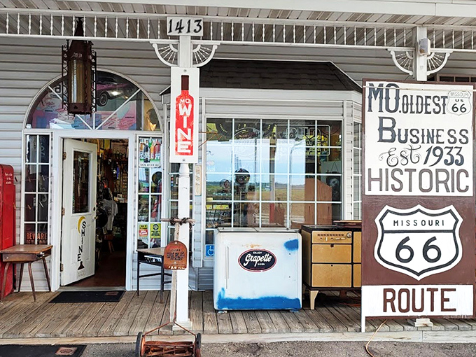 The weathered sign proclaiming "MO. OLDEST BUSINESS EST. 1933" isn't marketing spin&mdash;it's a time-travel invitation with a vintage Coke machine as your welcome committee.