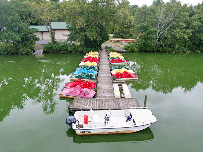 A lone bicycle waits patiently on a weathered dock, as if saying, "Take a moment, will you? This sunset reflection isn't going to appreciate itself."
