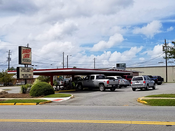 The classic red and white awning of Shady Lane beckons like a beacon of burger bliss in Tifton's landscape.