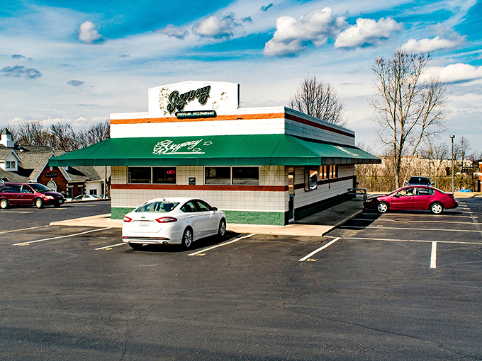 The white-tiled time machine with its signature green awning beckons hungry travelers. This isn't retro by design&mdash;it simply never stopped being wonderful.
