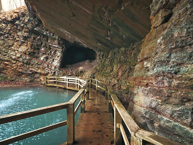 Nature's own infinity pool! The abandoned marble mine at Sloppy Floyd creates a stunning turquoise pool framed by towering rock walls and a delicate waterfall.