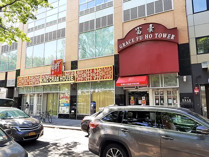 The bright red awning reading "UNLIMITED SEAFOOD BUCKET FEAST" works like a siren call to seafood lovers passing by on Manhattan's streets.