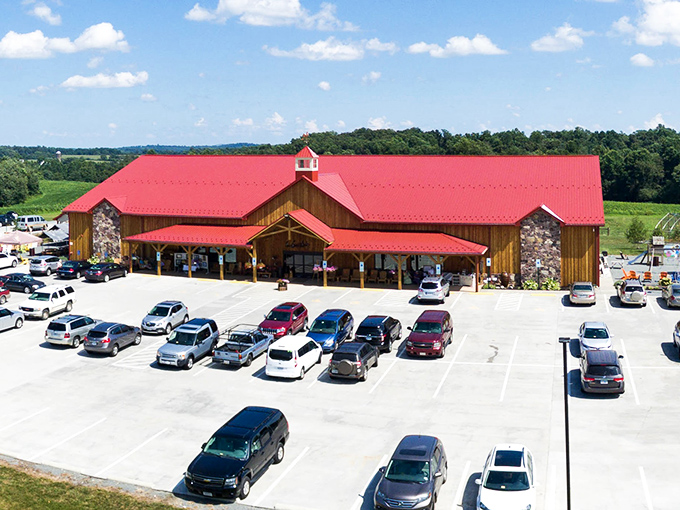 The iconic red roof of Yoder's stands out against Virginia's blue sky like a culinary lighthouse guiding hungry travelers to delicious shores.