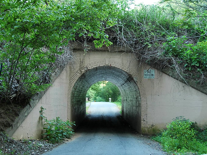 Innocence by day, mystery by night. The unassuming entrance to Bunny Man Bridge looks like something from a storybook&mdash;until the sun sets.