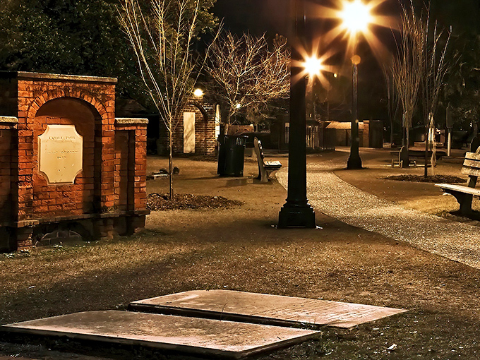 Spanish moss drapes over ancient brick structures like nature's funeral veil, creating an atmosphere that's both serene and slightly spine-tingling.
