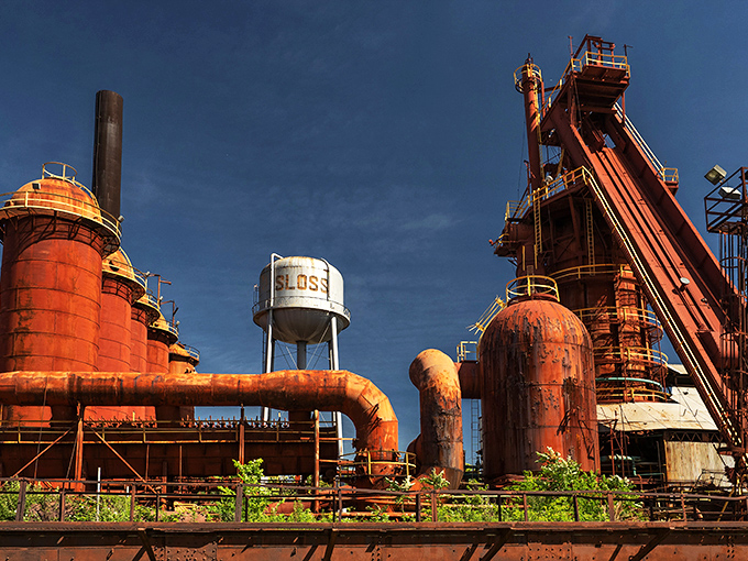 
Water dances skyward at Birmingham's urban oasis, a refreshing contrast to the industrial heat that once defined this corner of Alabama.
