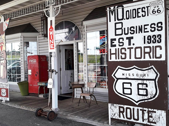 The weathered sign proclaiming "MO. OLDEST BUSINESS EST. 1933" isn't marketing spin&mdash;it's a time-travel invitation with a vintage Coke machine as your welcome committee.