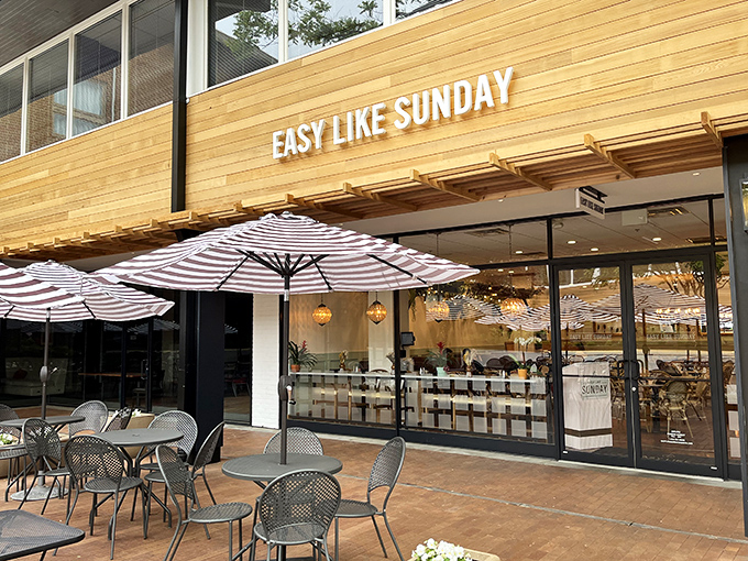 The warm wooden façade of Easy Like Sunday beckons like a culinary lighthouse, promising brunch salvation to hungry Baltimore souls.