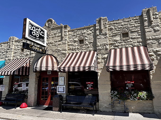 The stone fa&ccedil;ade of eggtc. with its charming striped awnings feels like discovering a secret breakfast society you've always wanted to join.