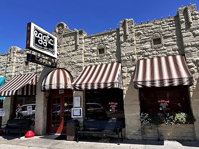 The iconic limestone exterior of eggtc. says "serious about breakfast" while the playful striped awnings whisper "but we still know how to have fun."
