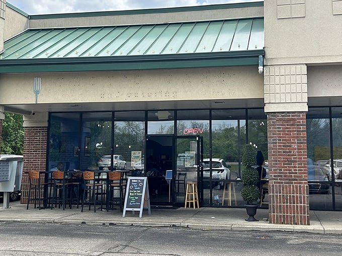 The unassuming storefront might not scream "culinary destination," but that chalkboard sign is like a beacon for breakfast enthusiasts across Ohio.
