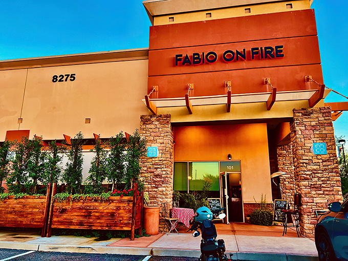 The unassuming desert-toned exterior of Fabio On Fire might not scream "authentic Italian," but inside awaits a culinary adventure that would make any nonna proud.