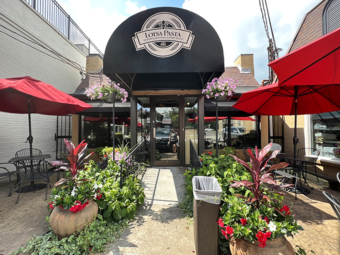 The charming fa&ccedil;ade of Lotsa Pasta beckons like an old friend. That ornate sign promises Mediterranean treasures await behind that classic black door.