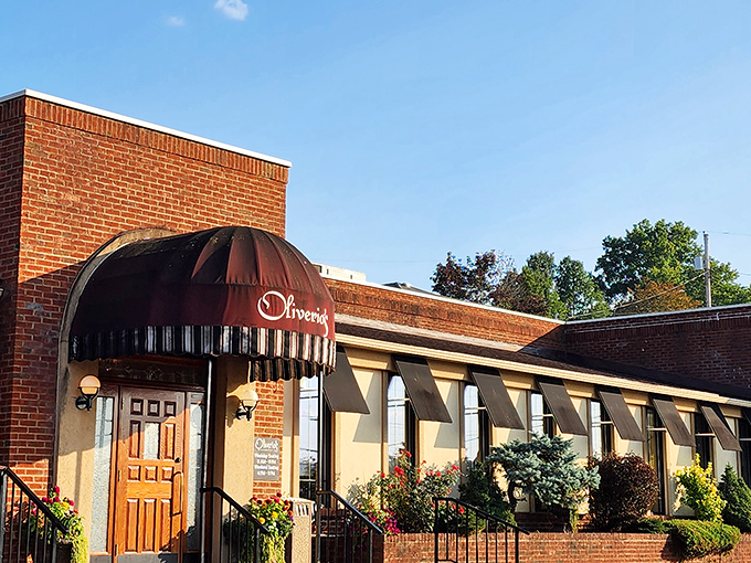 The unassuming brick exterior with its burgundy awning doesn't scream "food paradise," but that's how the best Italian treasures often hide in plain sight.