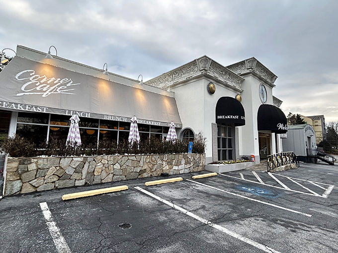 The elegant white facade of Corner Cafe stands like a culinary lighthouse in Buckhead, beckoning hungry Atlantans with promises of breakfast bliss.