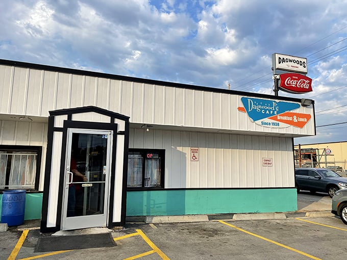 The unassuming exterior of Dagwood's Cafe stands as a beacon to breakfast lovers, its vintage turquoise trim and classic signage promising authentic diner delights within.