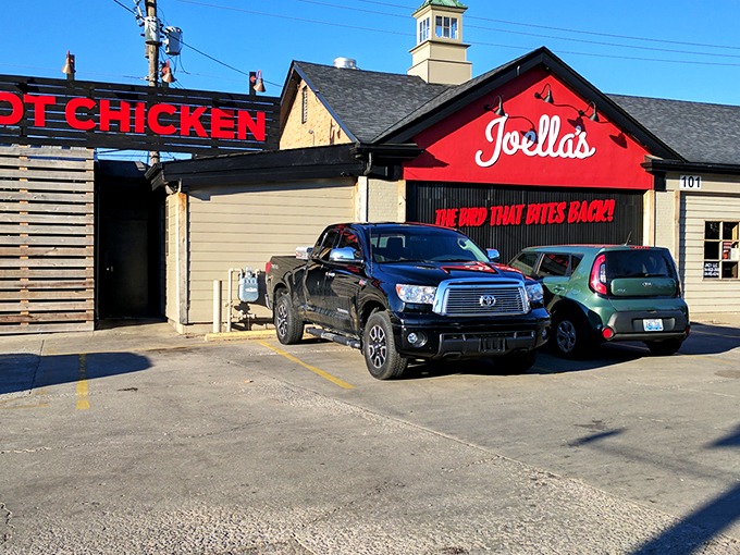 The Bird That Bites Back! isn't just a catchy slogan&mdash;it's a fiery promise painted across Joella's distinctive red facade that beckons heat-seekers from miles around.