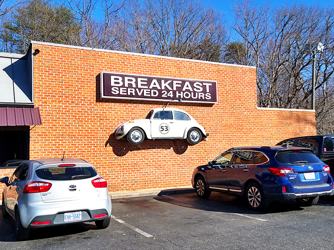 The iconic white Beetle #53 mounted on Herbie's brick exterior isn't just decoration&mdash;it's a beacon calling hungry travelers home to breakfast, served 24/7.