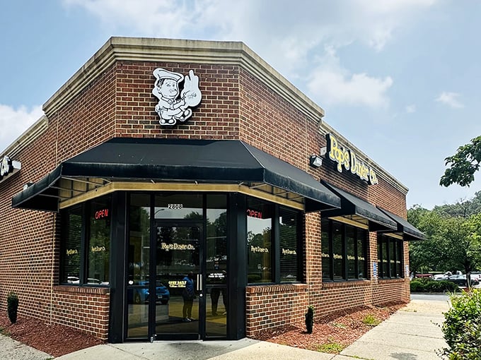 The unassuming brick exterior of Pop's Diner Co. hides a breakfast paradise within. Like finding a treasure map disguised as a gas station receipt.